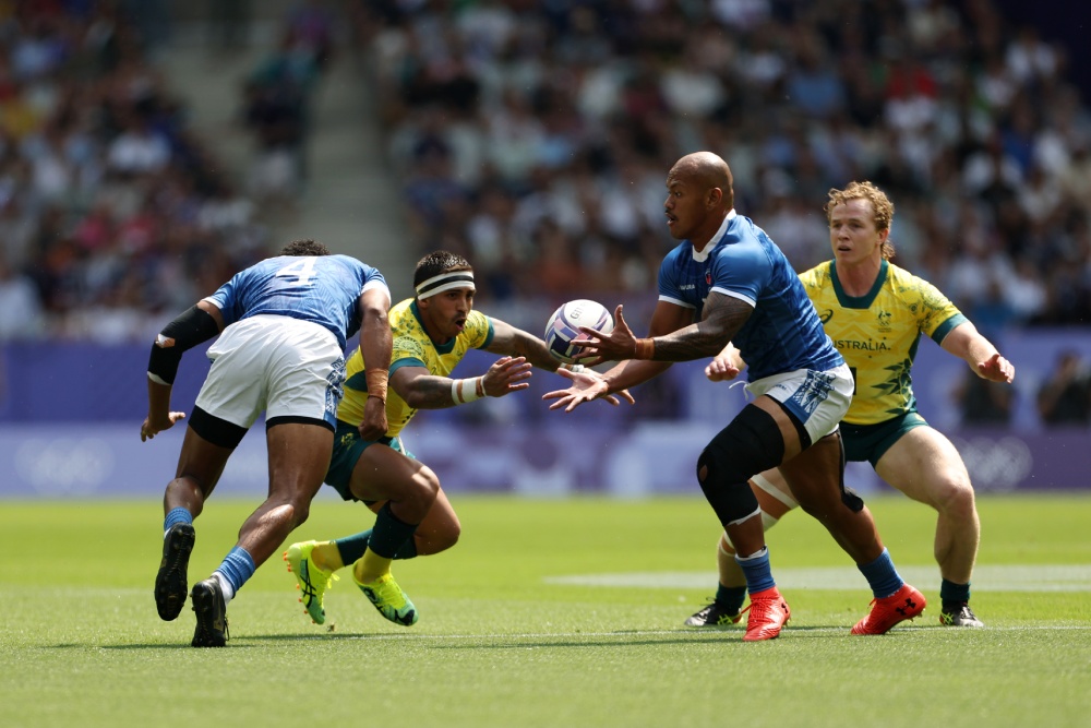 Longbottom's tribute sets Paris tone for golden tilt