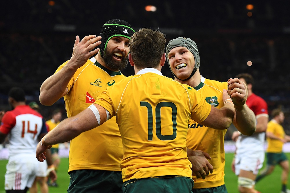 Wallabies hang on against France in Paris